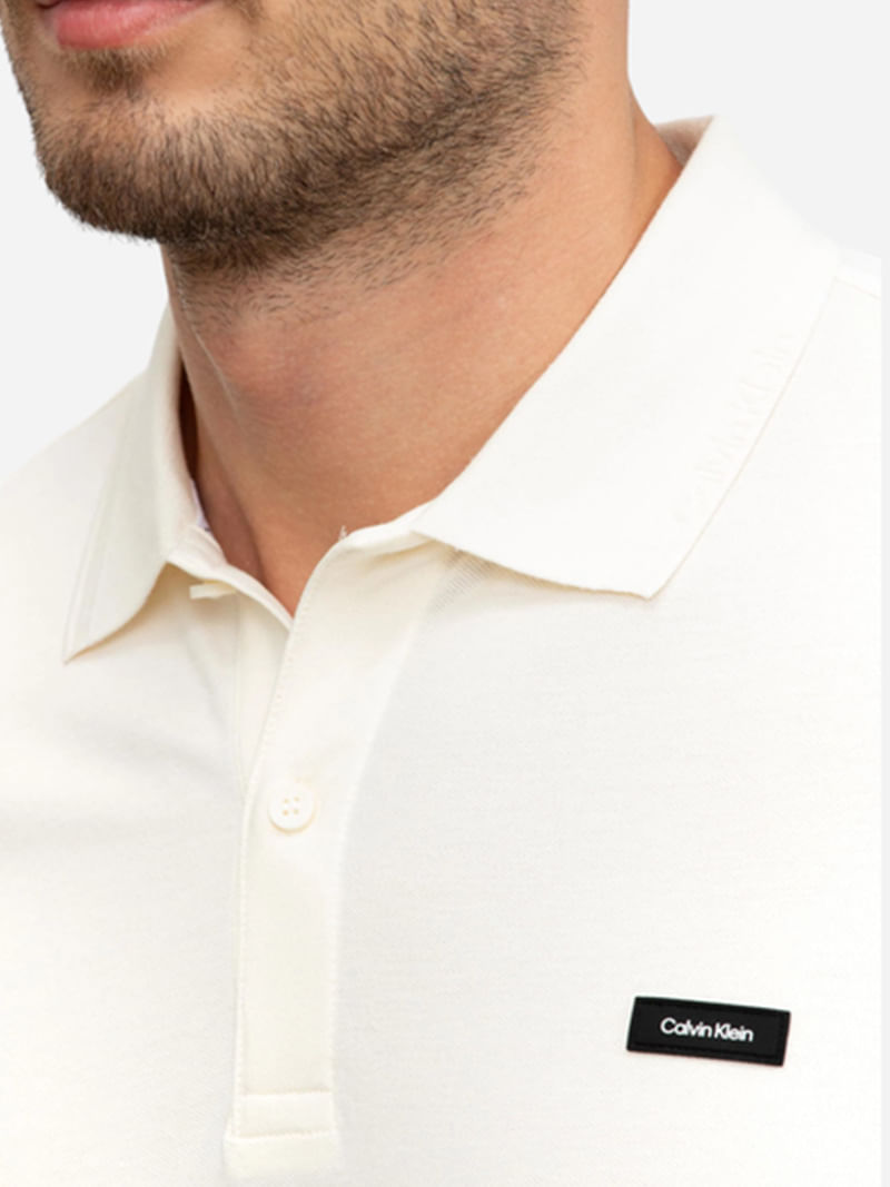 POLO SLIM DE TEJIDO TÉCNICO TÉRMICO